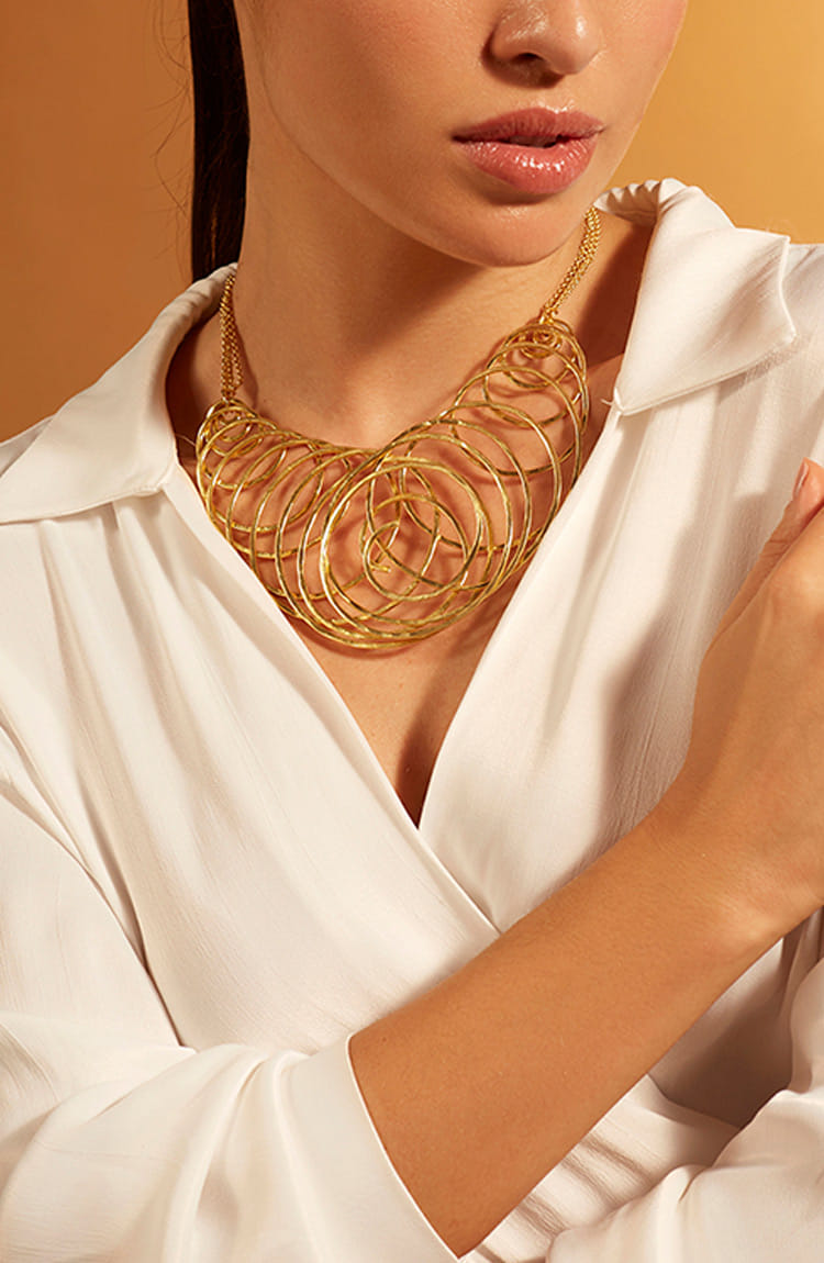 Buy Gold coil necklace by Joules by Radhika at Aashni and Co