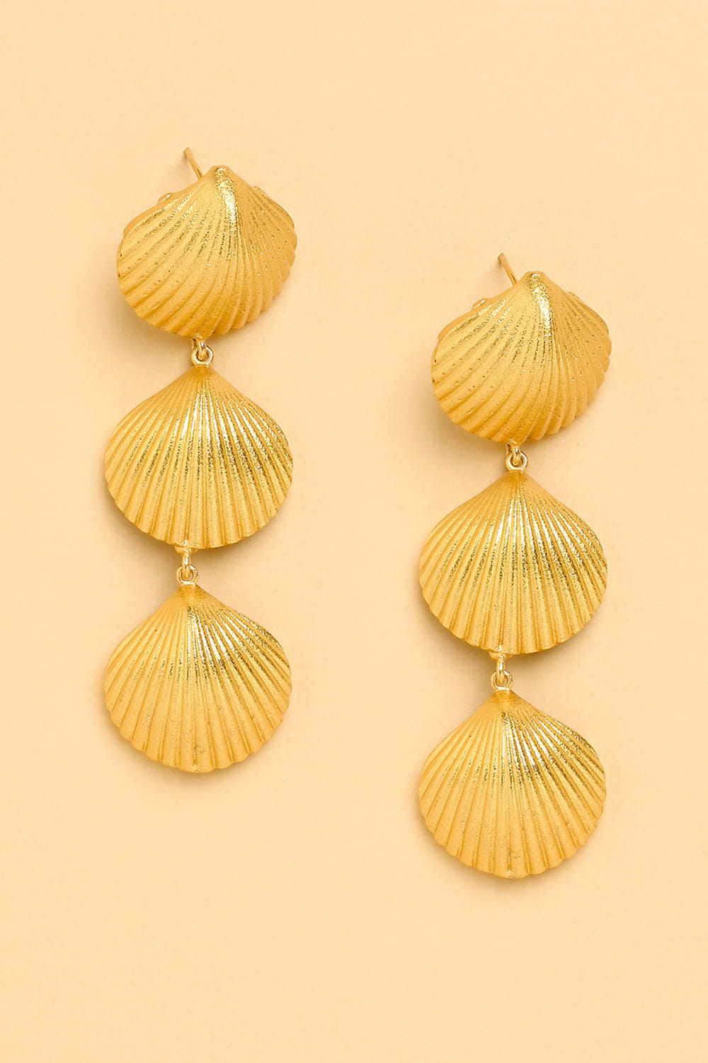Buy Gold seashell drop earrings by Joules by Radhika at Aashni and Co