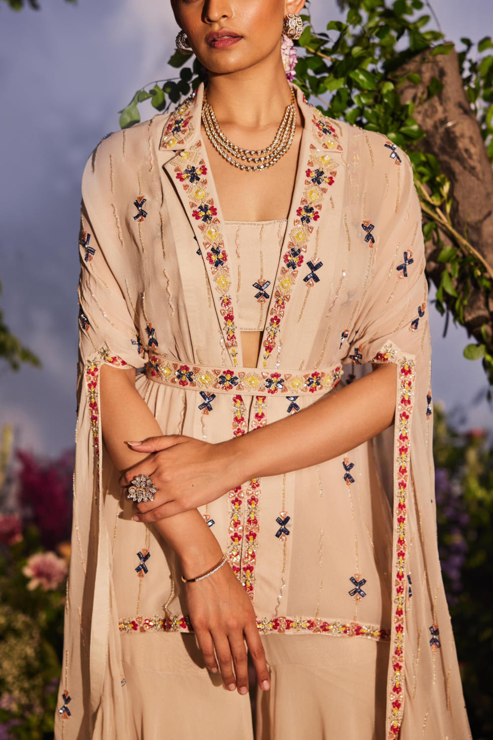 Buy Ivory cape jacket and gharara set by Miku Kumar at Aashni and Co