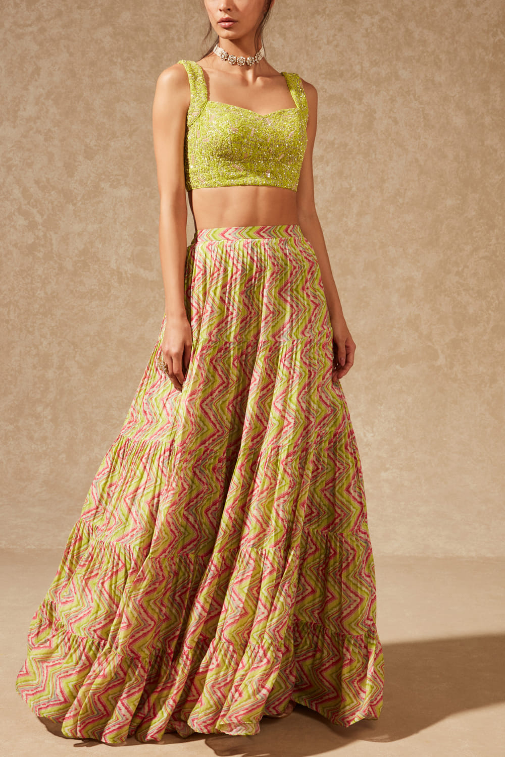 Buy Green chevron printed tiered georgette lehenga set by Chamee and ...