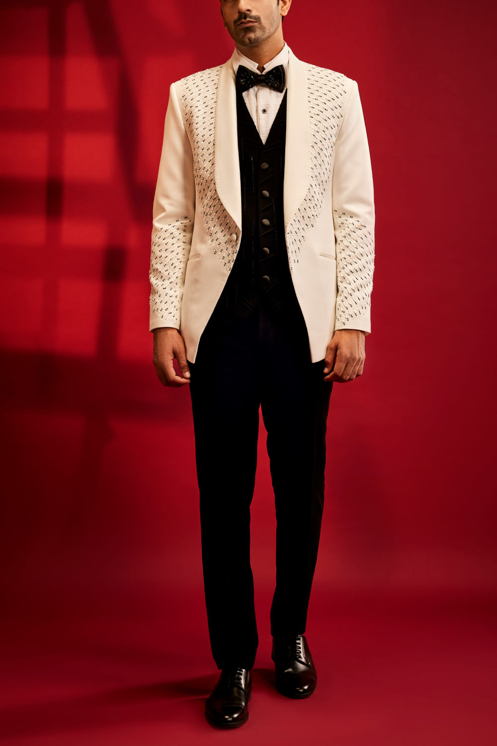 Buy Ivory pearl work tuxedo set by Sarab Khanijou at Aashni and Co