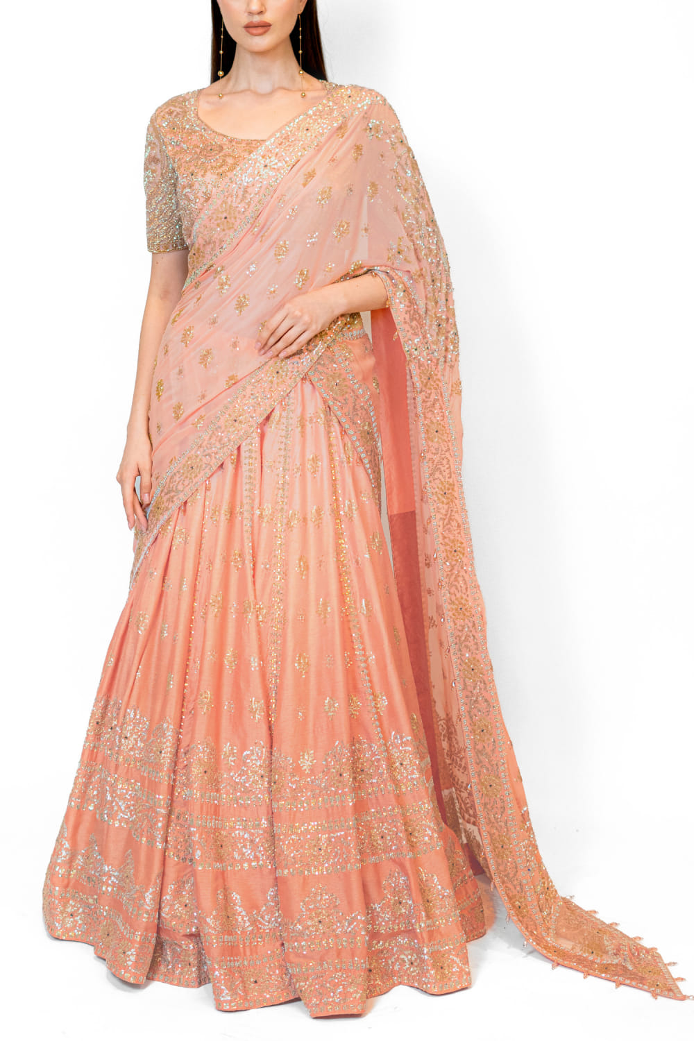 Buy Shaded peach sequin embellished lehenga set by Rabani & Rakha at ...