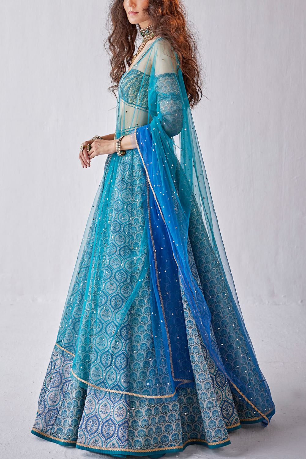 Buy Teal blue ogee print lehenga set by Cedar & Pine at Aashni and Co